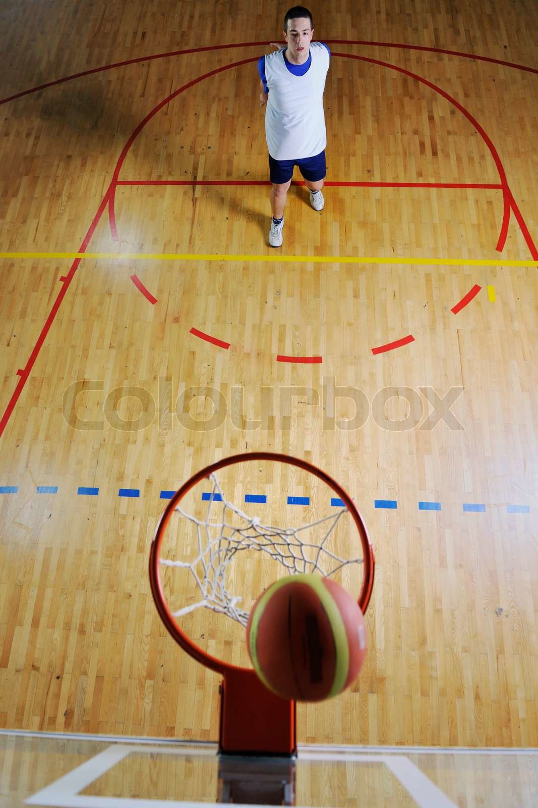 basketball player shooting | Stock image | Colourbox
