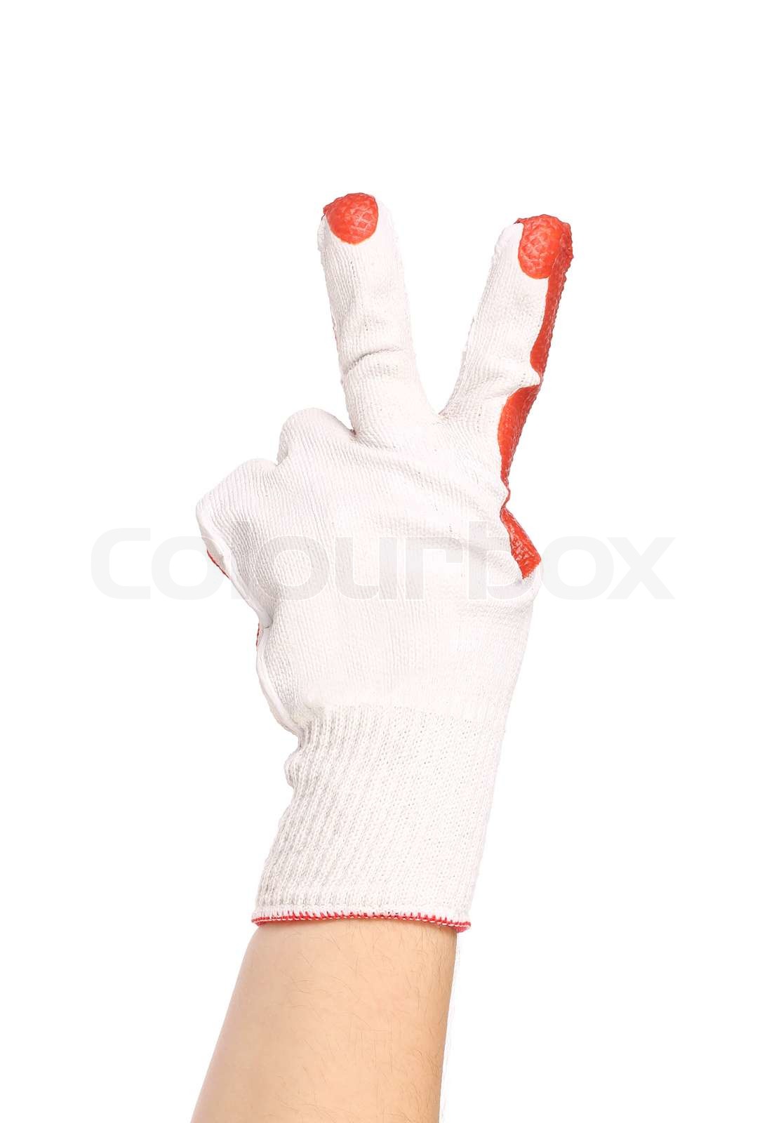 Hand in gloves shows two | Stock image | Colourbox