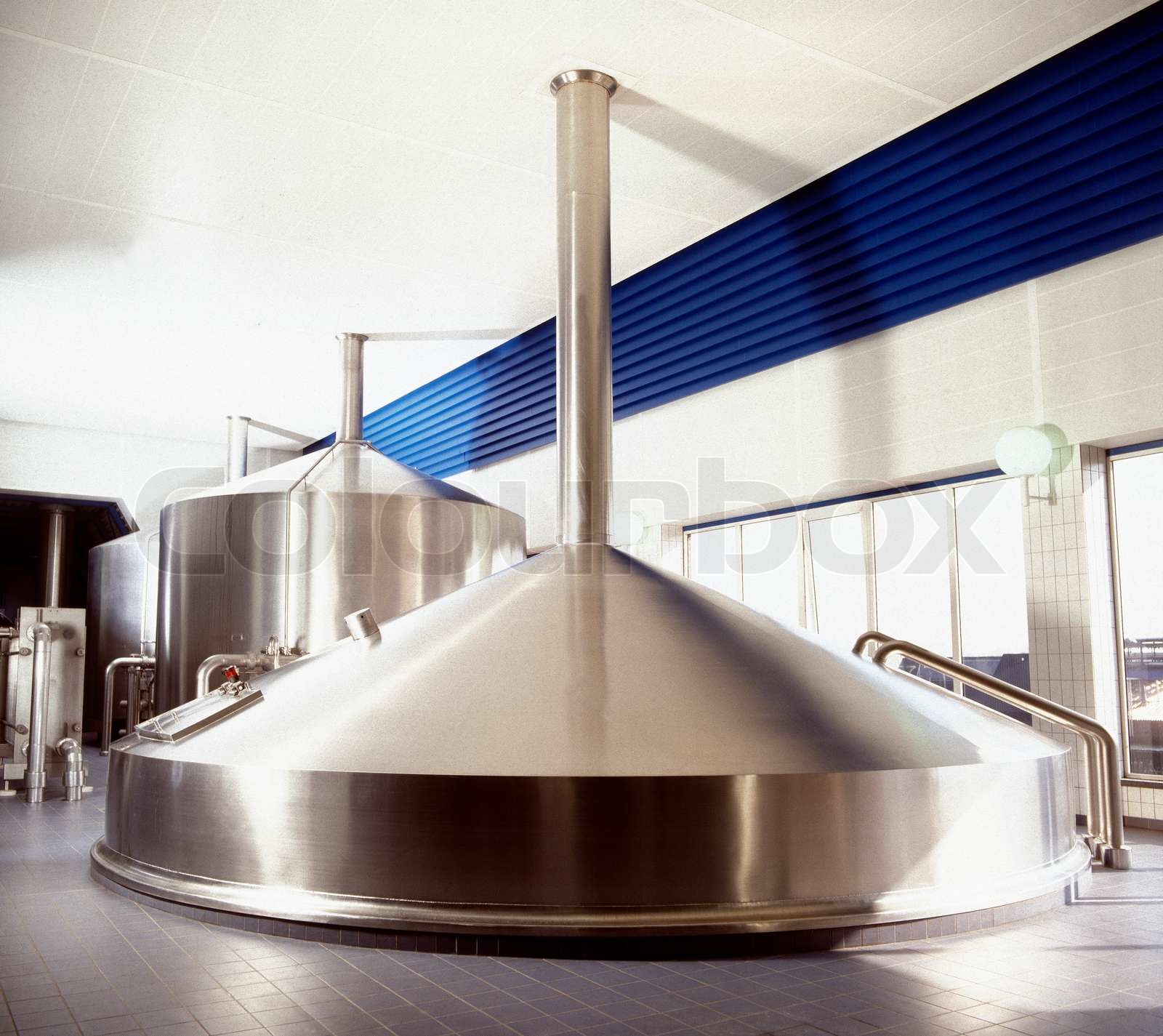 brewery workshop with stainless fermentation vats | Stock image | Colourbox