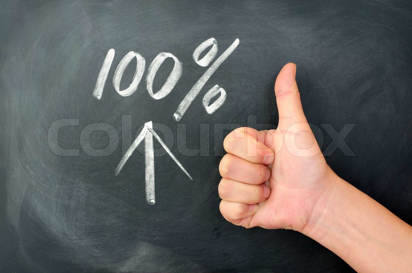Thumb up with a 100 percent sign | Stock image | Colourbox