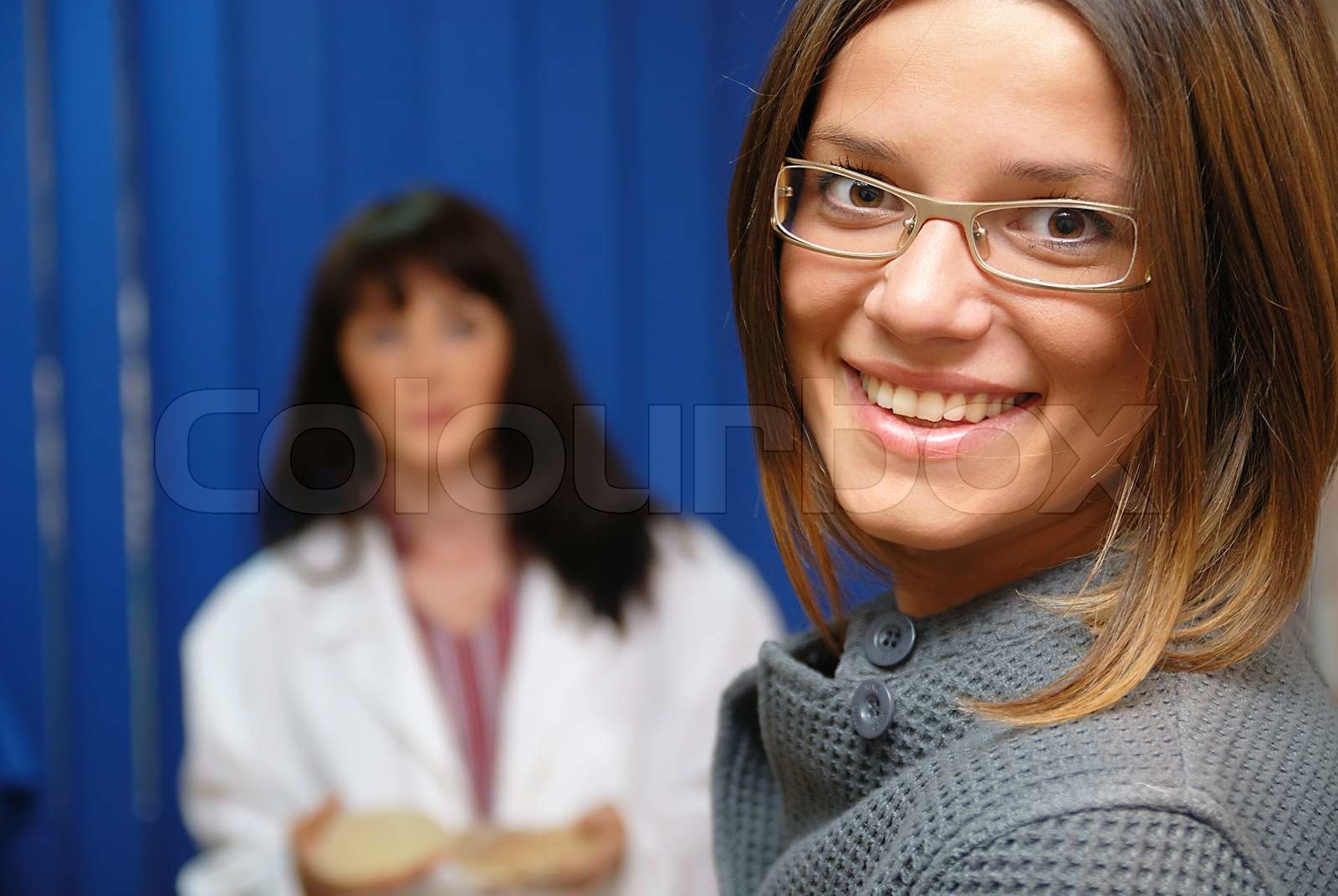 glückliche Patient und Arzt | Stock Bild | Colourbox