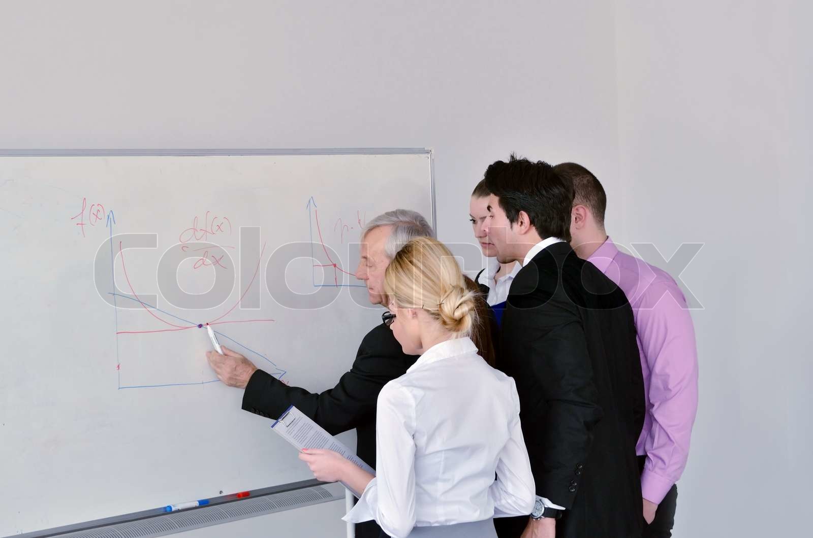 Senior business man giving a presentation | Stock image | Colourbox Senior business man giving a presentation | Stock image | Colourbox