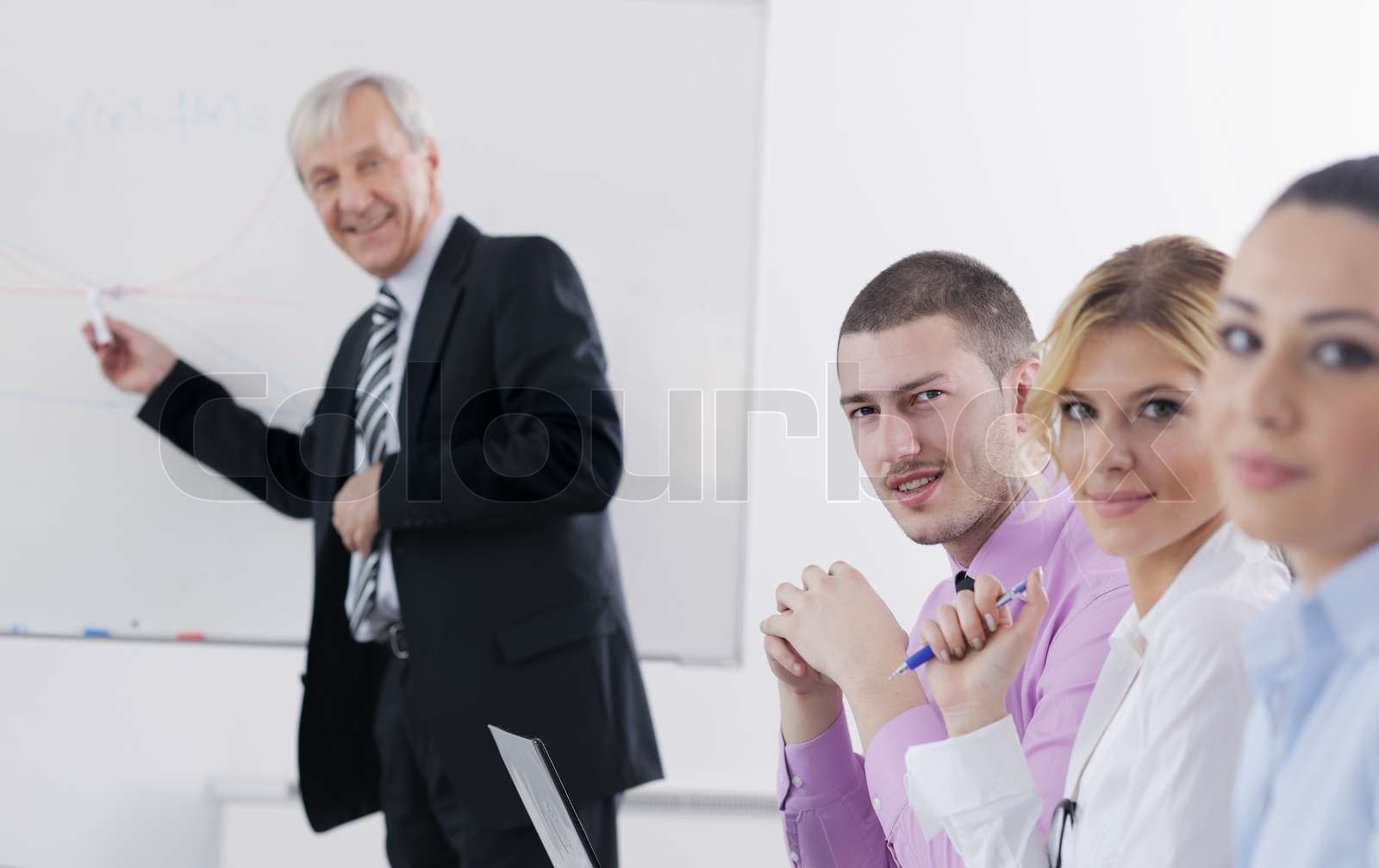 Senior business man giving a presentation | Stock image | Colourbox Senior business man giving a presentation | Stock image | Colourbox