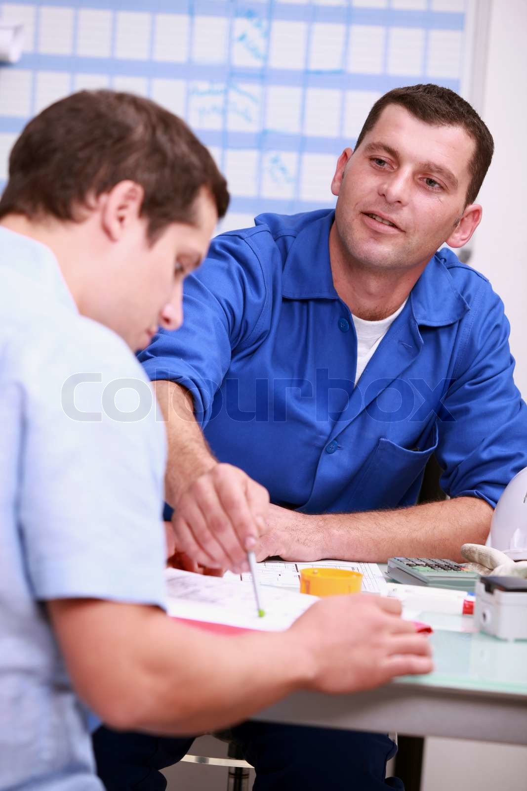portrait of a contractor and client | Stock image | Colourbox