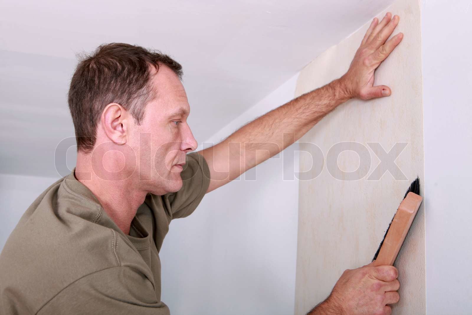 Decorator Hanging Wallpaper Stock Image Colourbox decorator-hanging-wallpaper-stock-image-colourbox