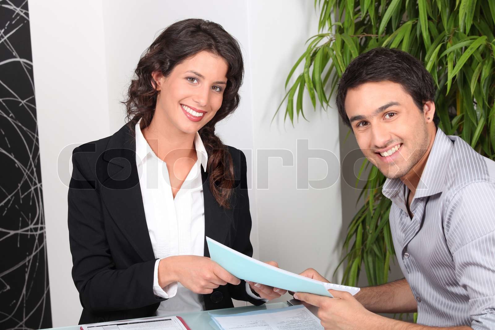 Agent and client | Stock image | Colourbox