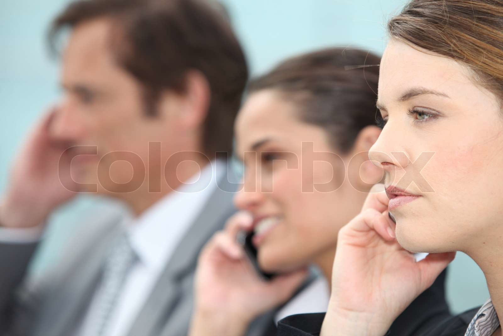 Bussiness people on the phone. | Stock image | Colourbox