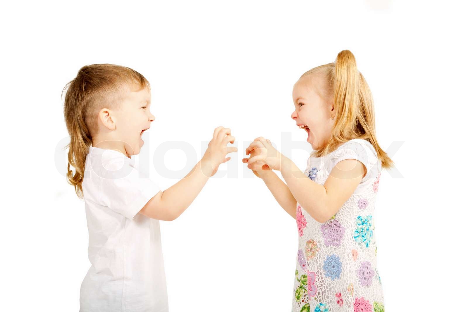 Small children fighting and quarreling. | Stock image | Colourbox