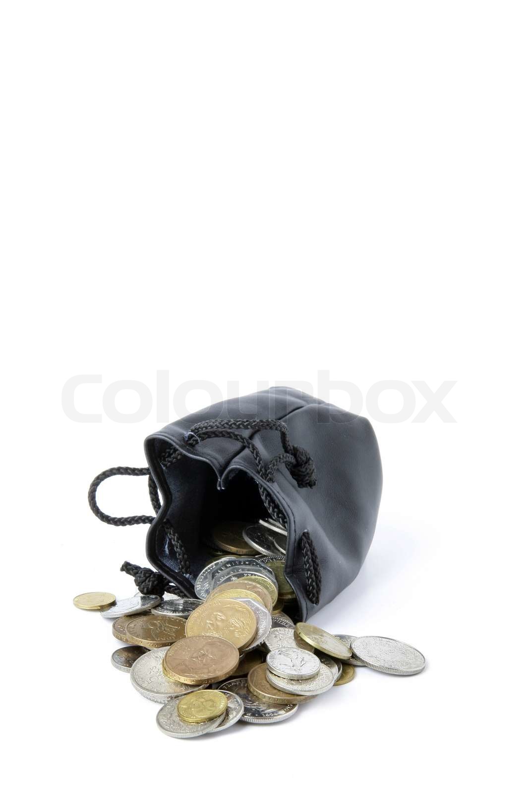 Coins spilling from purse | Stock image | Colourbox