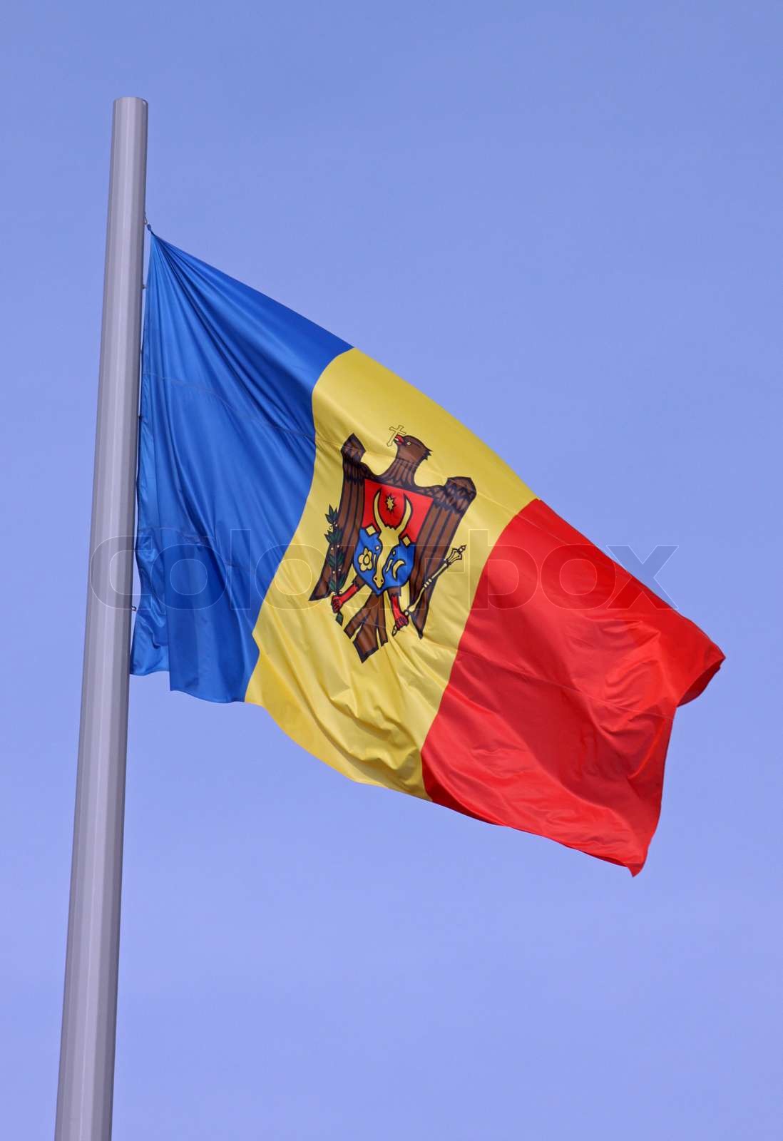 flag of Moldova over blue sky | Stock image | Colourbox