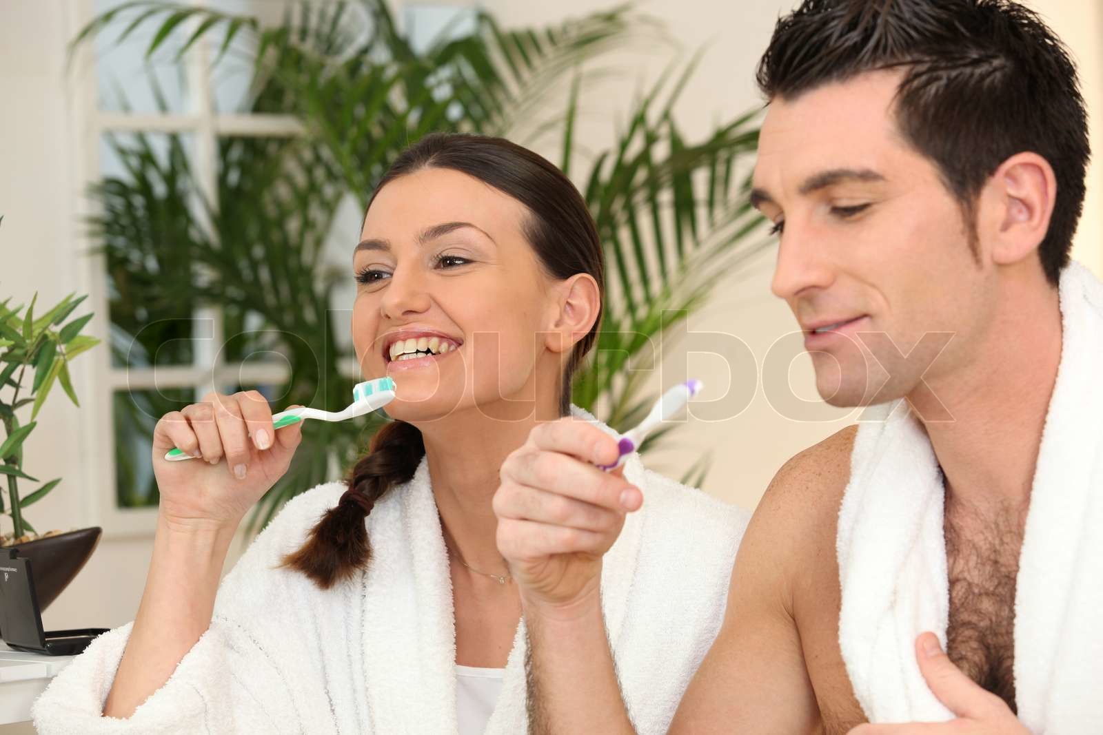 Couple brushing teeth | Stock image | Colourbox