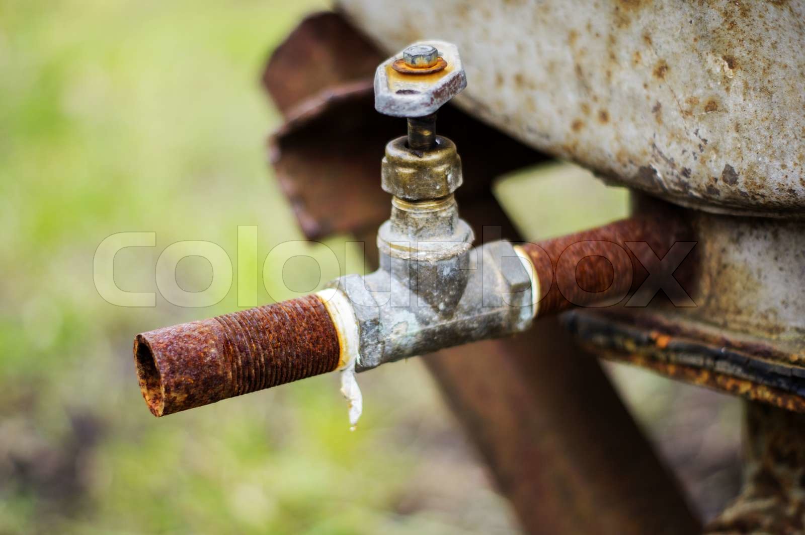old rusty industrial tap water pipe and valve | Stock image | Colourbox