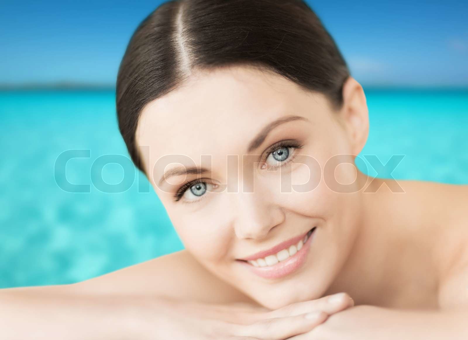 smiling woman on the beach | Stock image | Colourbox