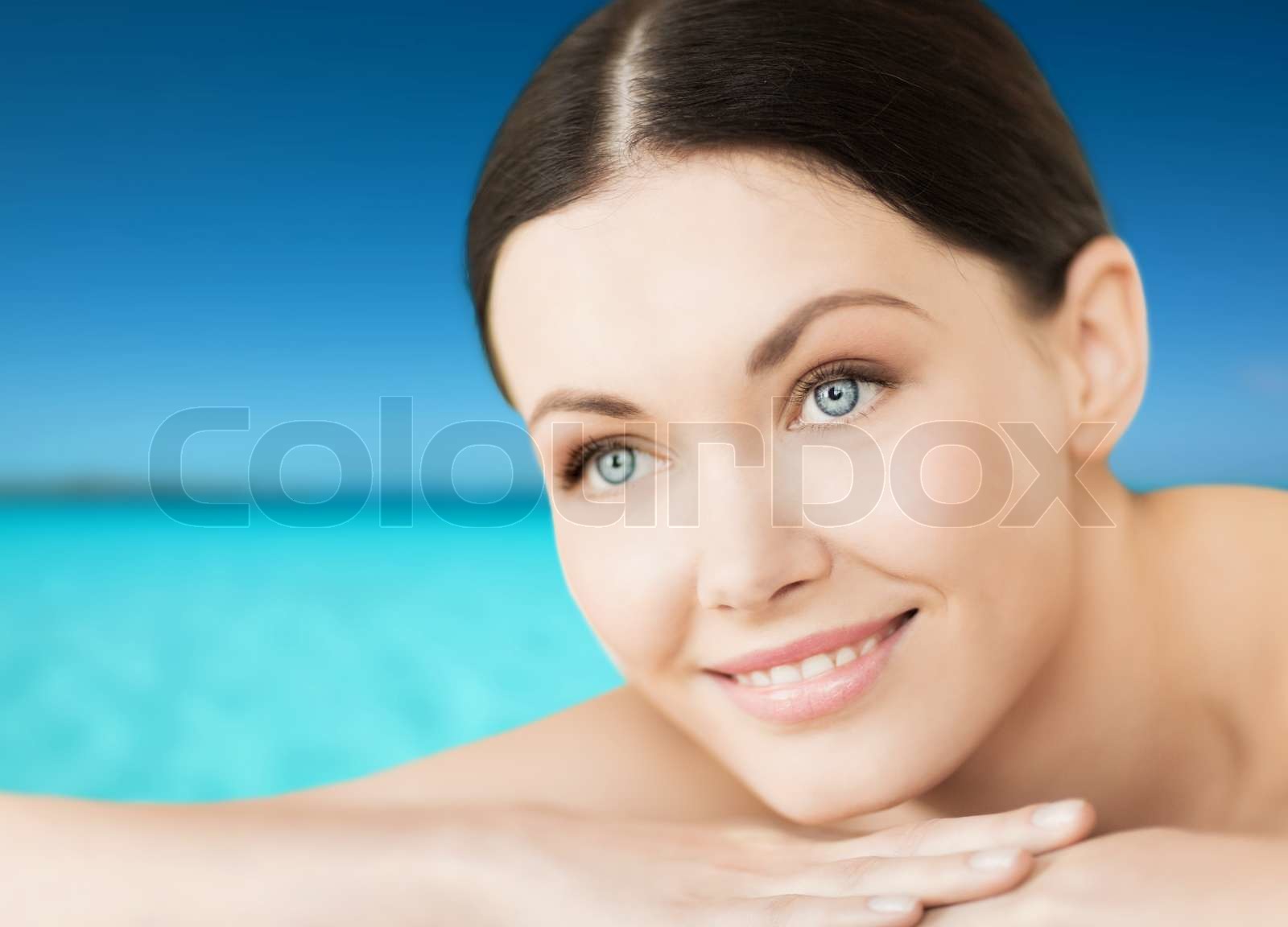 smiling woman on the beach | Stock image | Colourbox