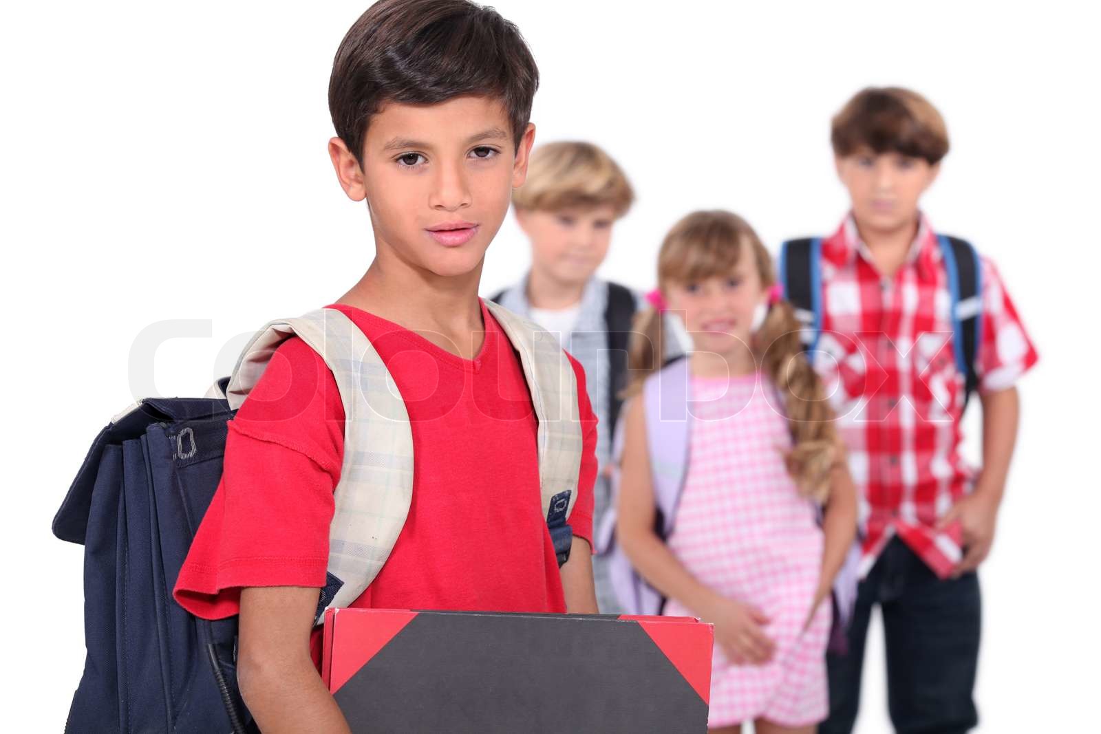 vier junge Schulkinder | Stock Bild | Colourbox