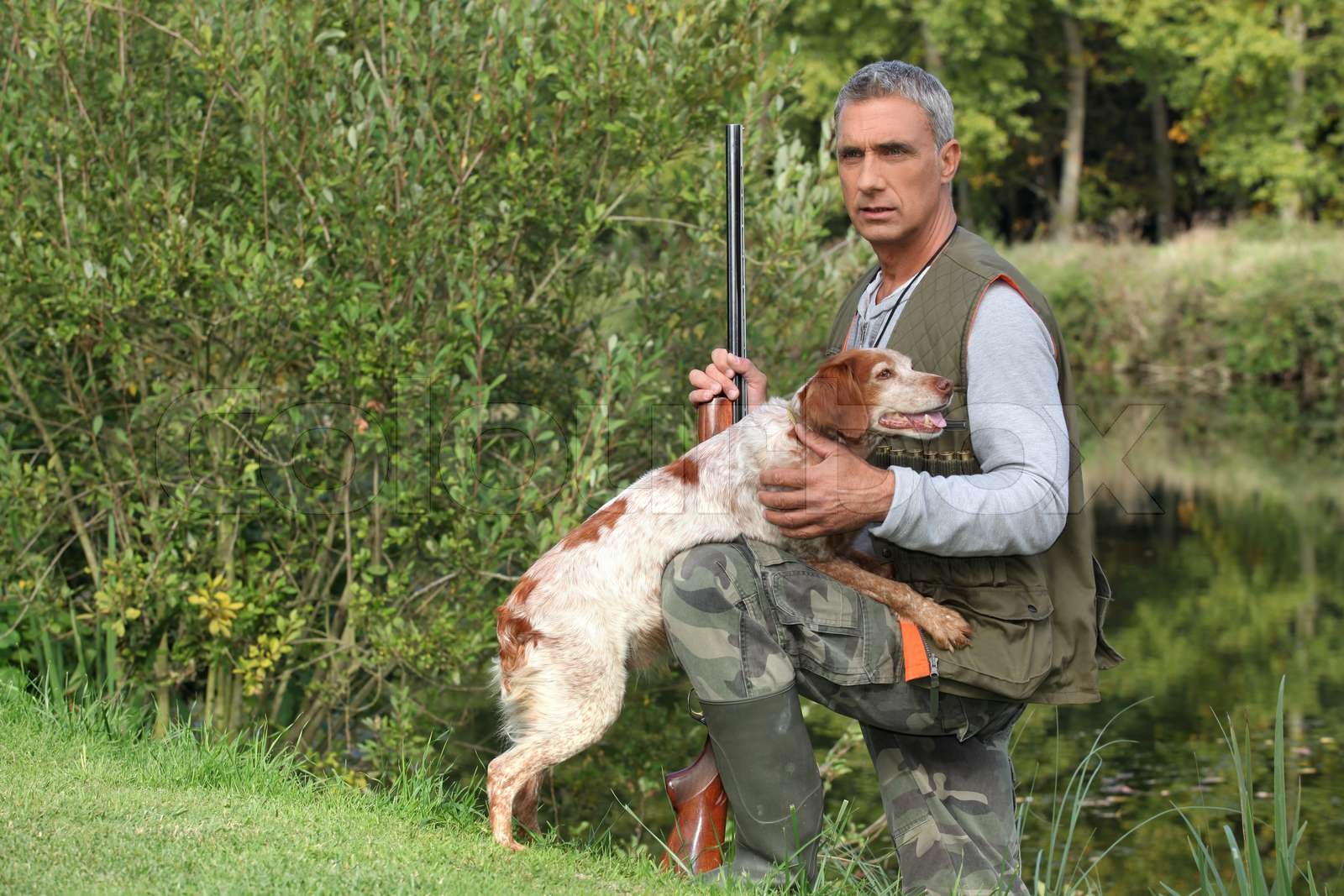 hunter with dog | Stock image | Colourbox