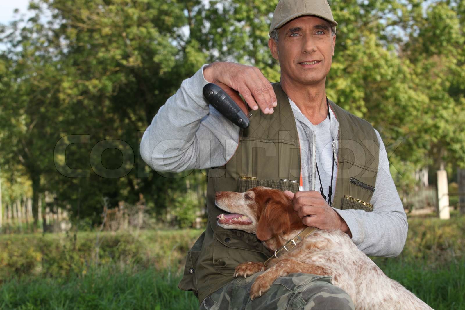 Hunter with dog | Stock image | Colourbox