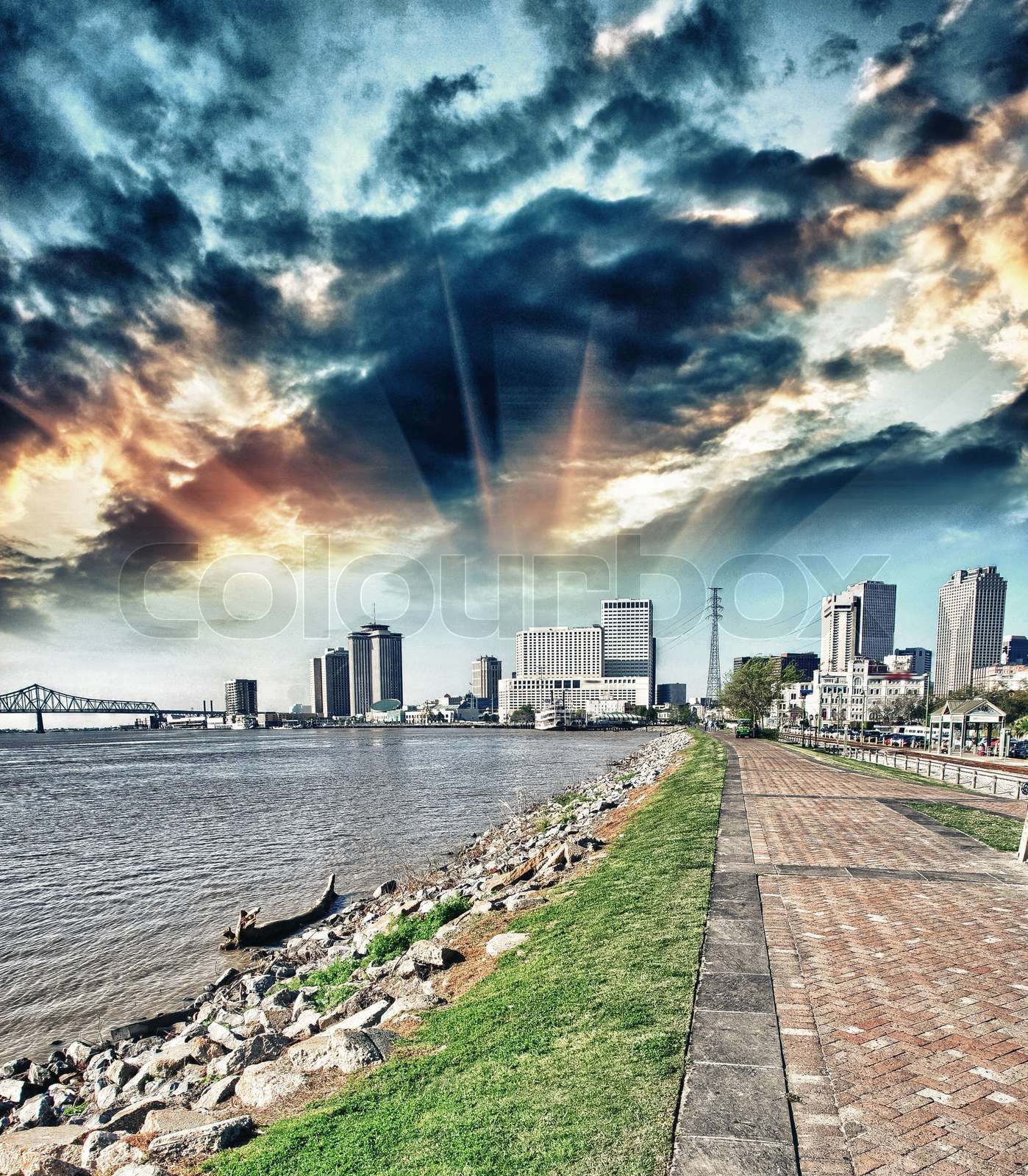 New Orleans, Lousiana. Mississippi waterfront with walkway and city ...