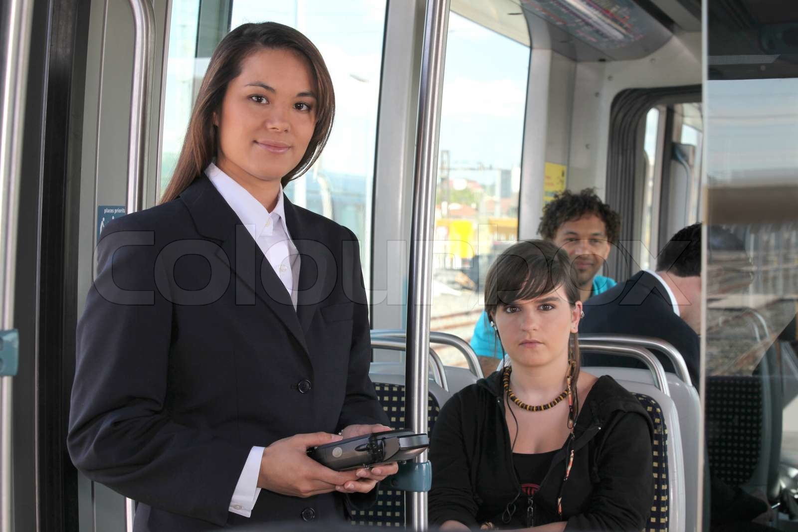 Female ticket inspector | Stock image | Colourbox