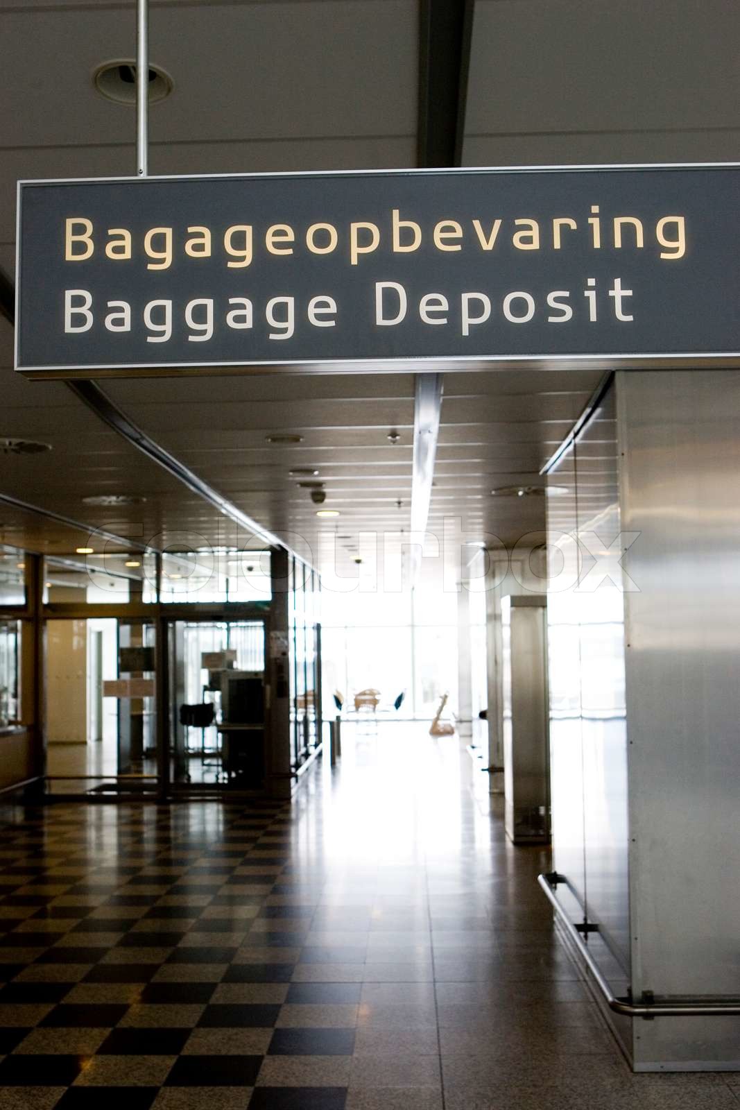 Baggage deposit sign at the airport | Stock image | Colourbox