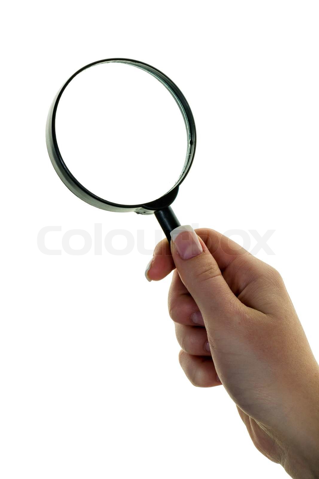 Hand mit einer Lupe | Stock Bild | Colourbox
