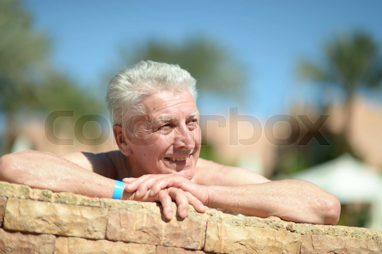 Elderly man sunbath | Stock image | Colourbox