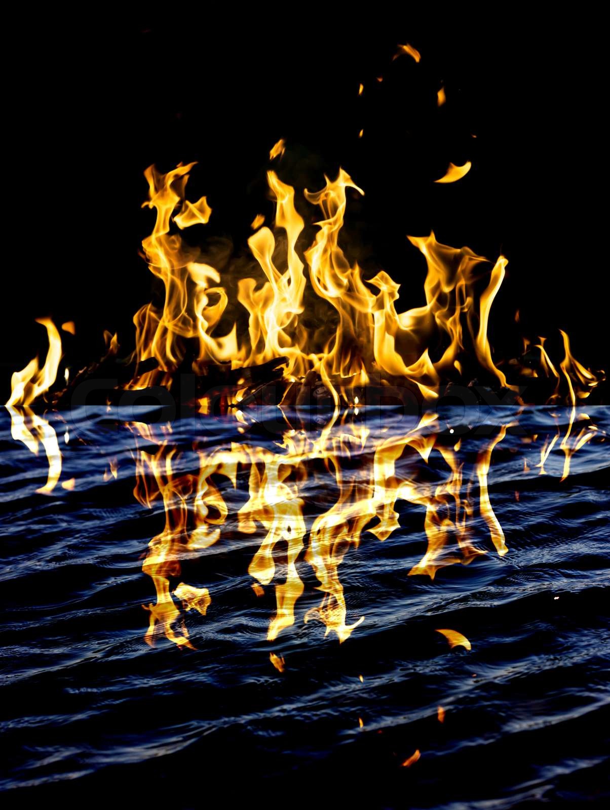flame fire with reflection in water | Stock image | Colourbox