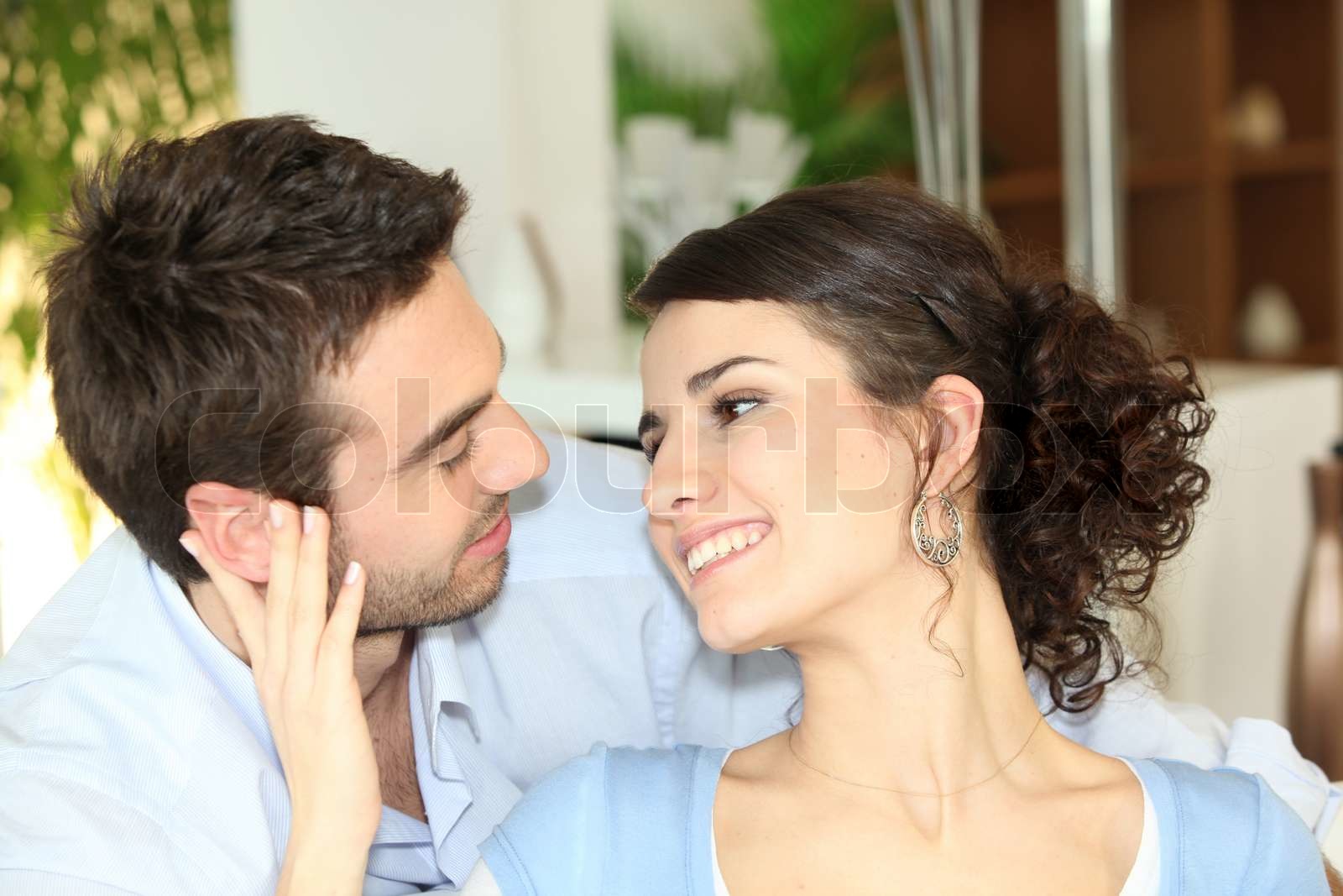 Couple staring lovingly into each other's eyes | Stock image | Colourbox
