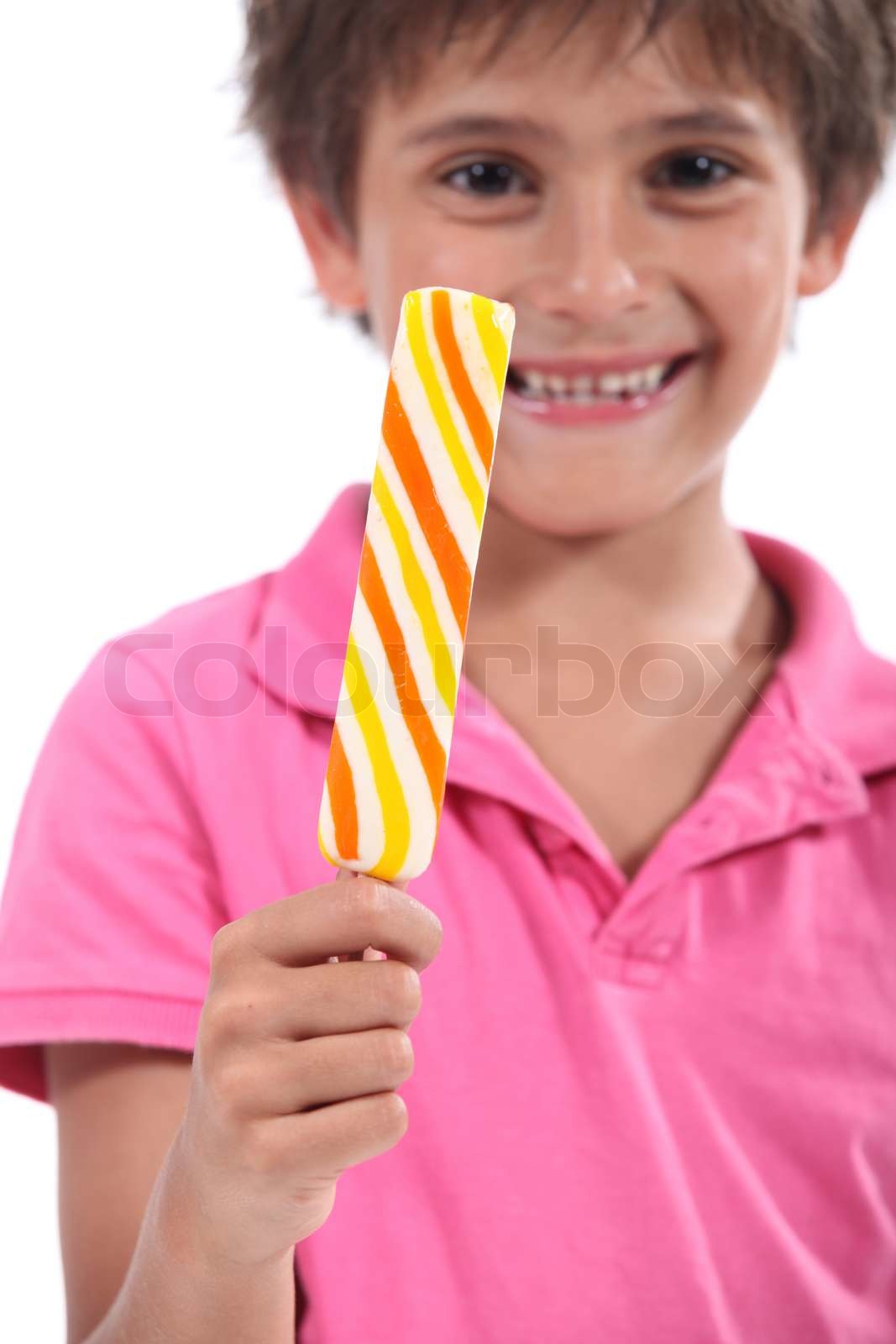 Junge mit einem Lolly-pop | Stock Bild | Colourbox