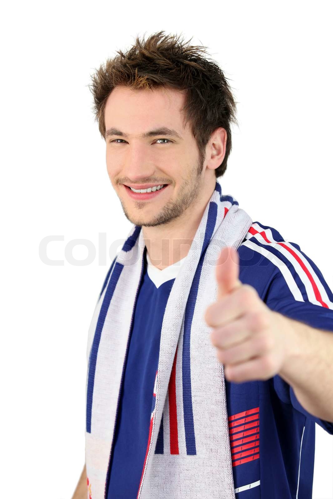 football fan making a thumbs up sign | Stock image | Colourbox