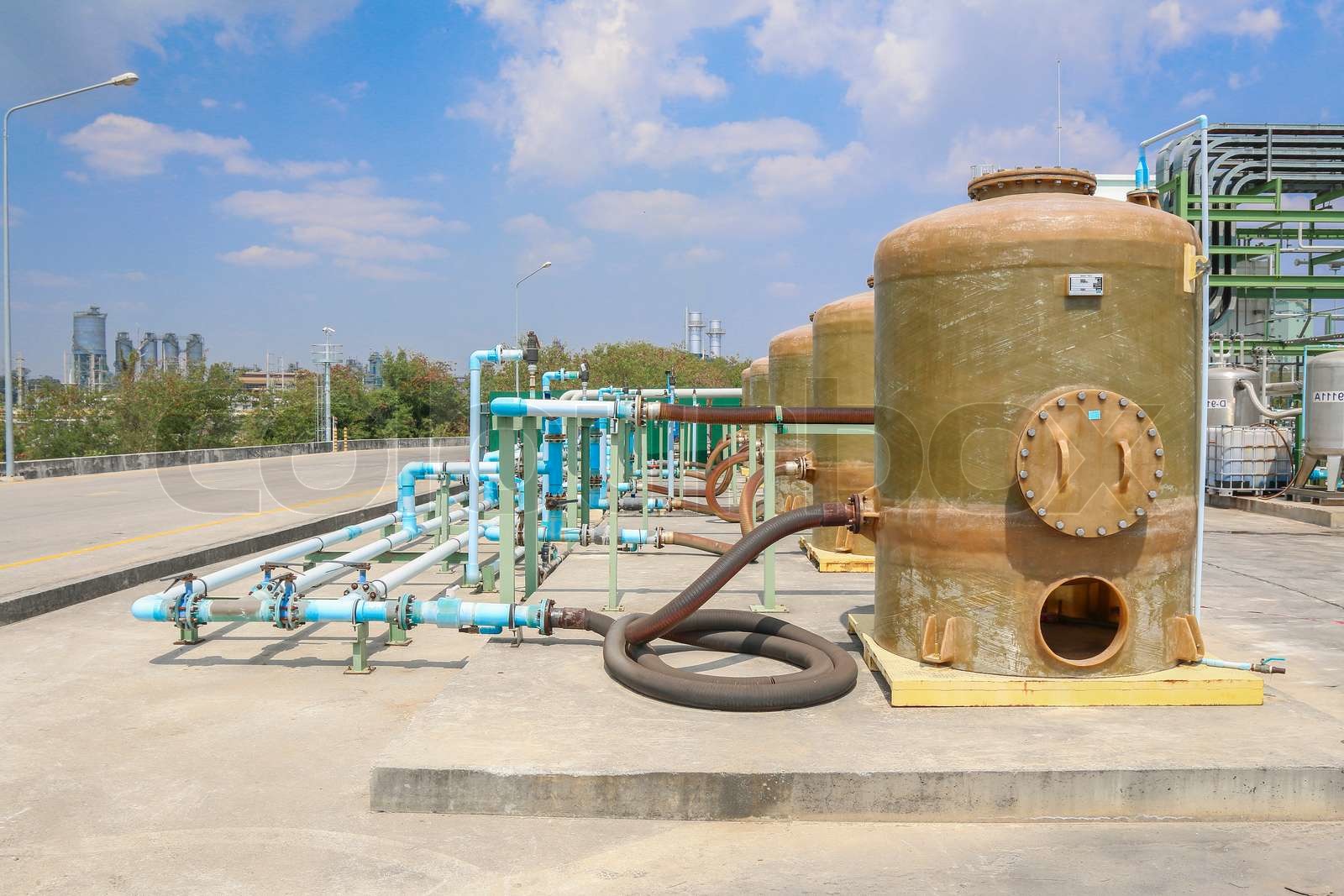 Chemical tank storage with PVC pipe line | Stock image | Colourbox