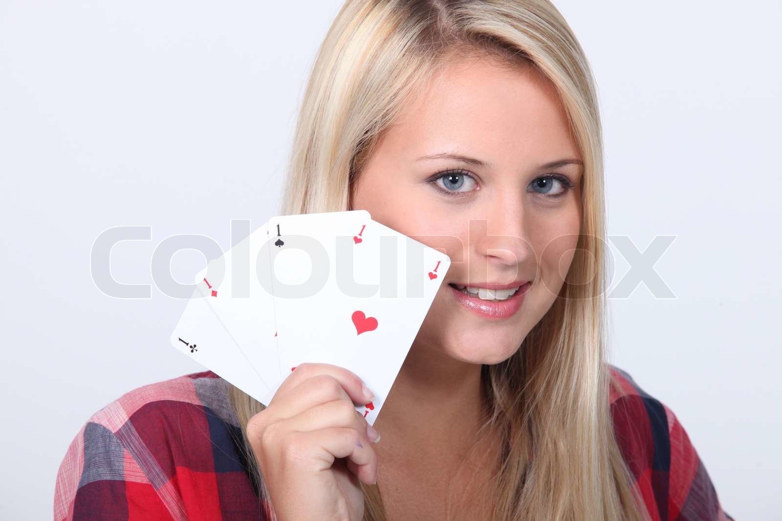Girl showing cards | Stock image | Colourbox
