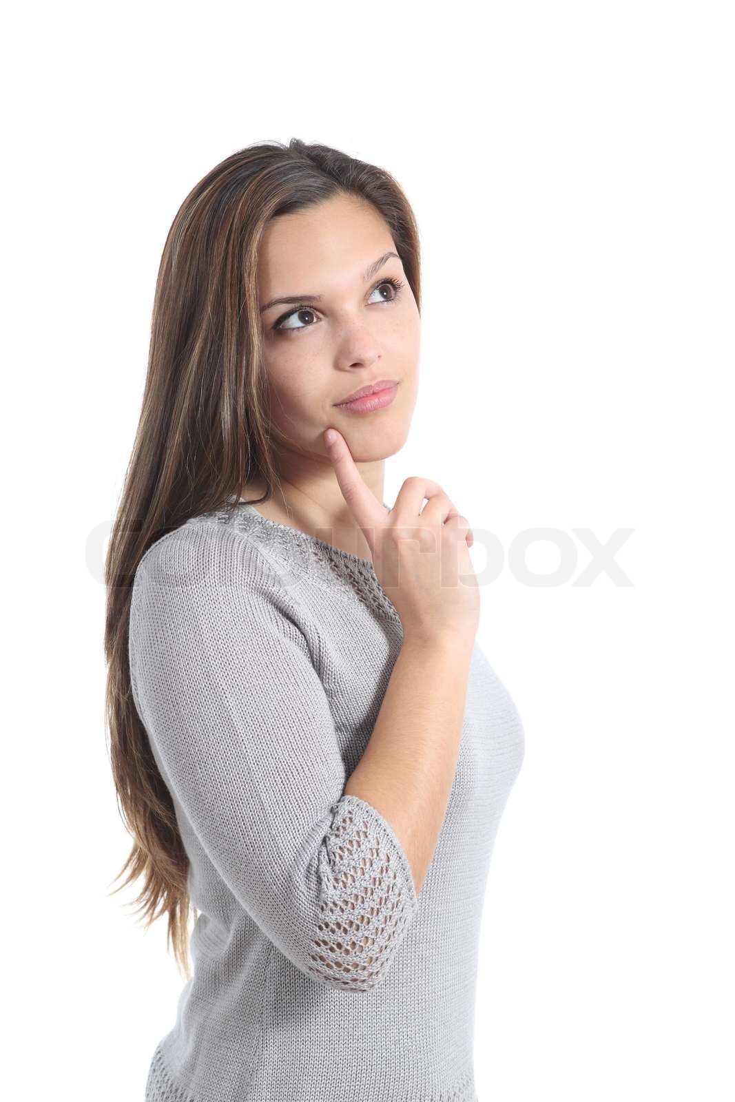 hübsche Frau nachdenklich schauen oben | Stock Bild | Colourbox