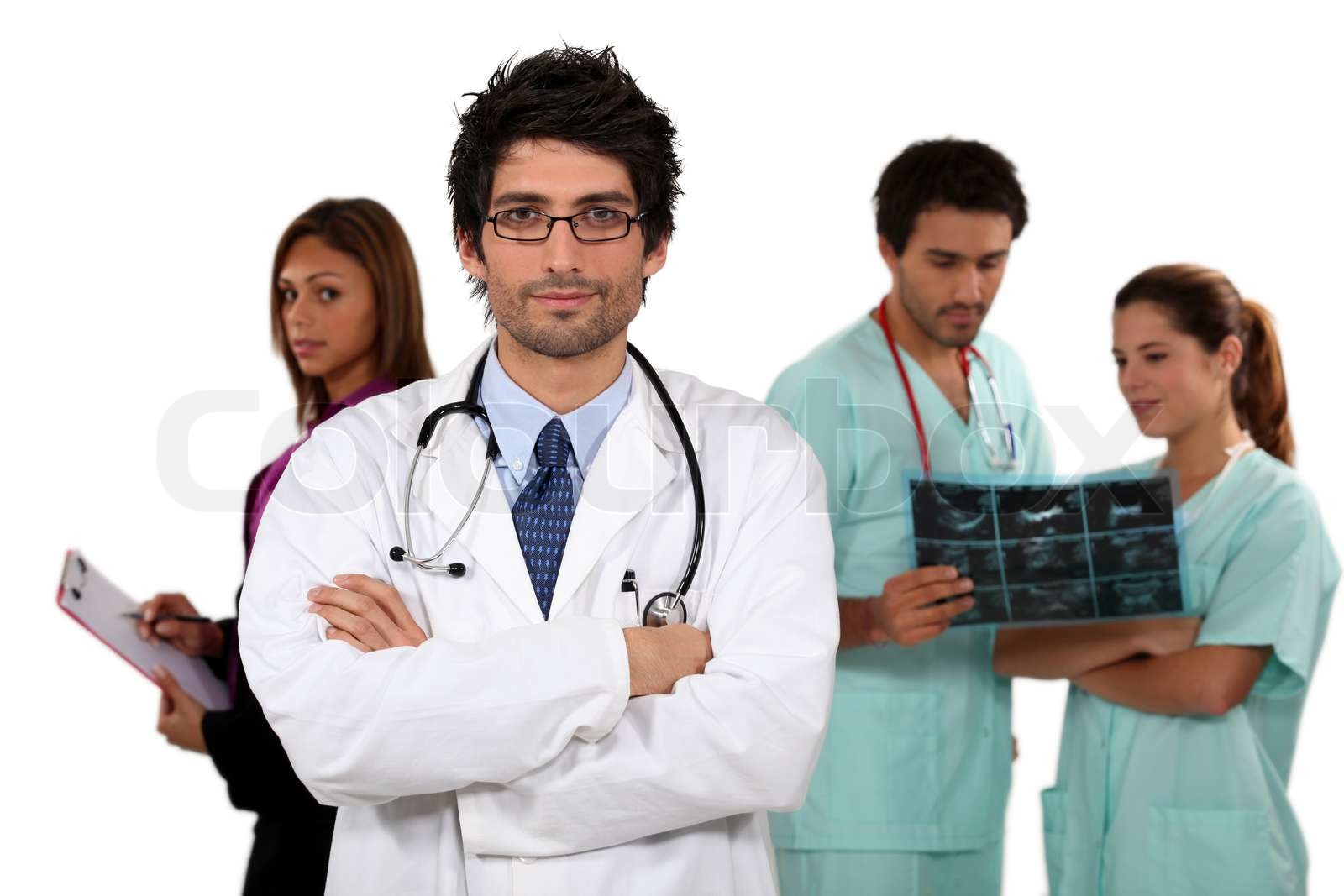 Doctor and his medical team | Stock image | Colourbox