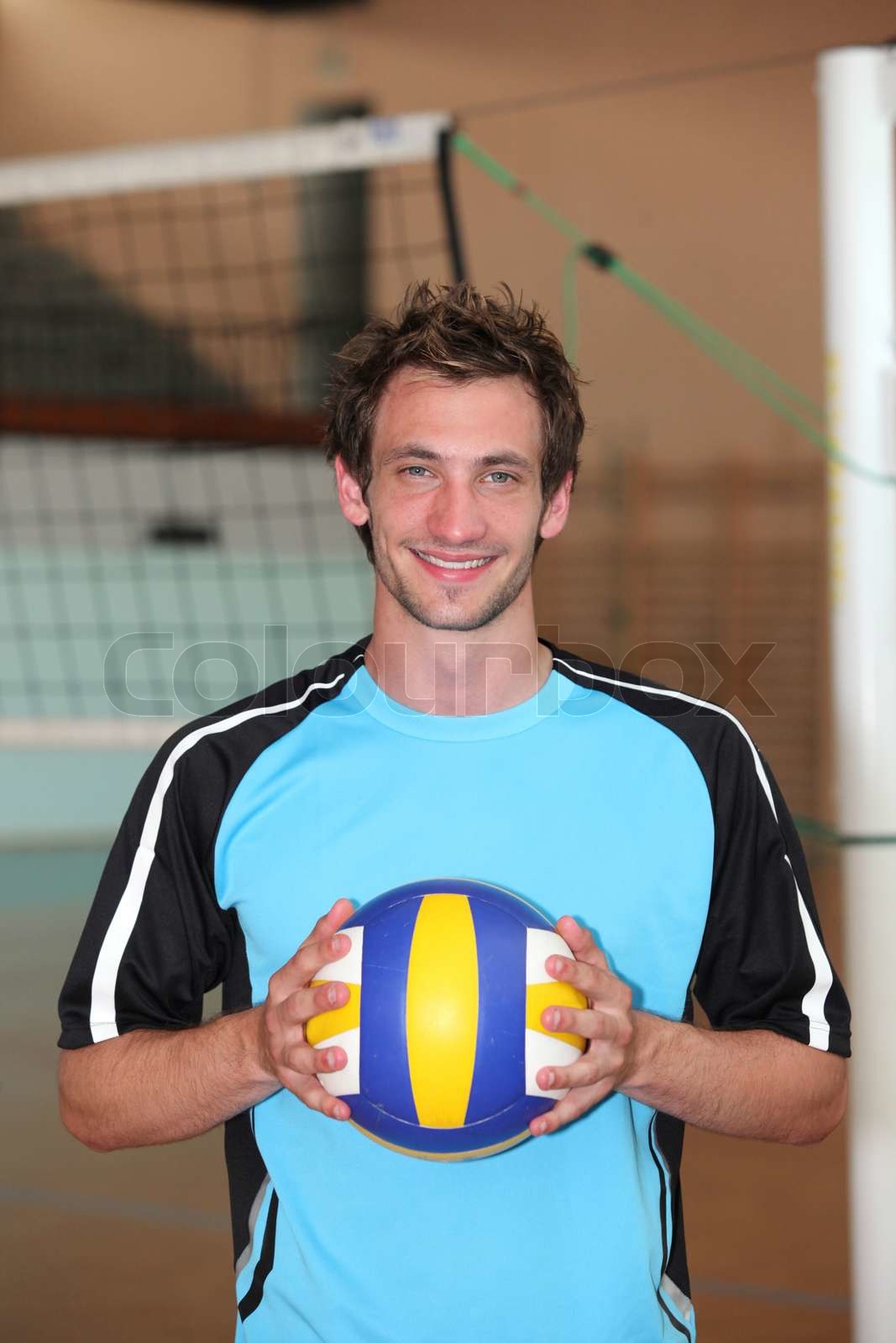 Volleyball player with ball | Stock image | Colourbox