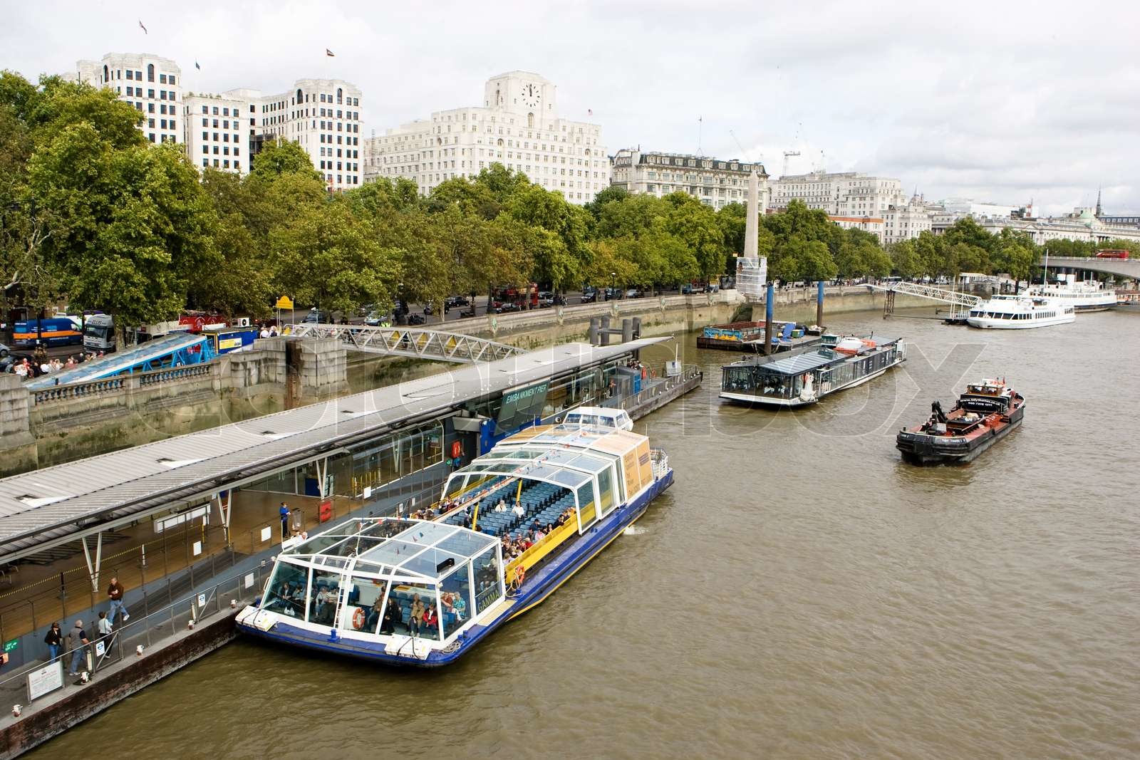 Ferries plying along the Thames river | Stock image | Colourbox