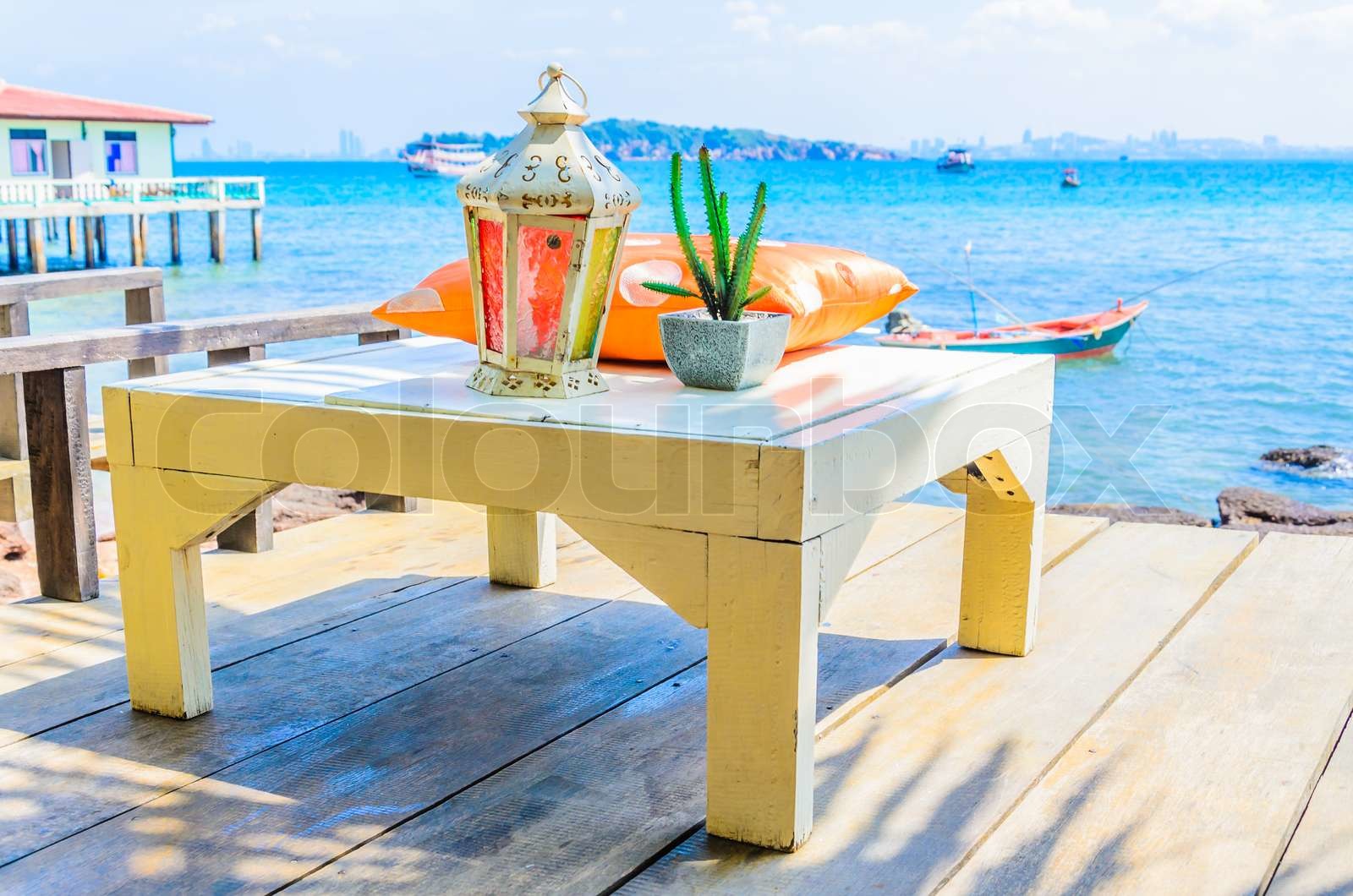 Table on the beach | Stock image | Colourbox