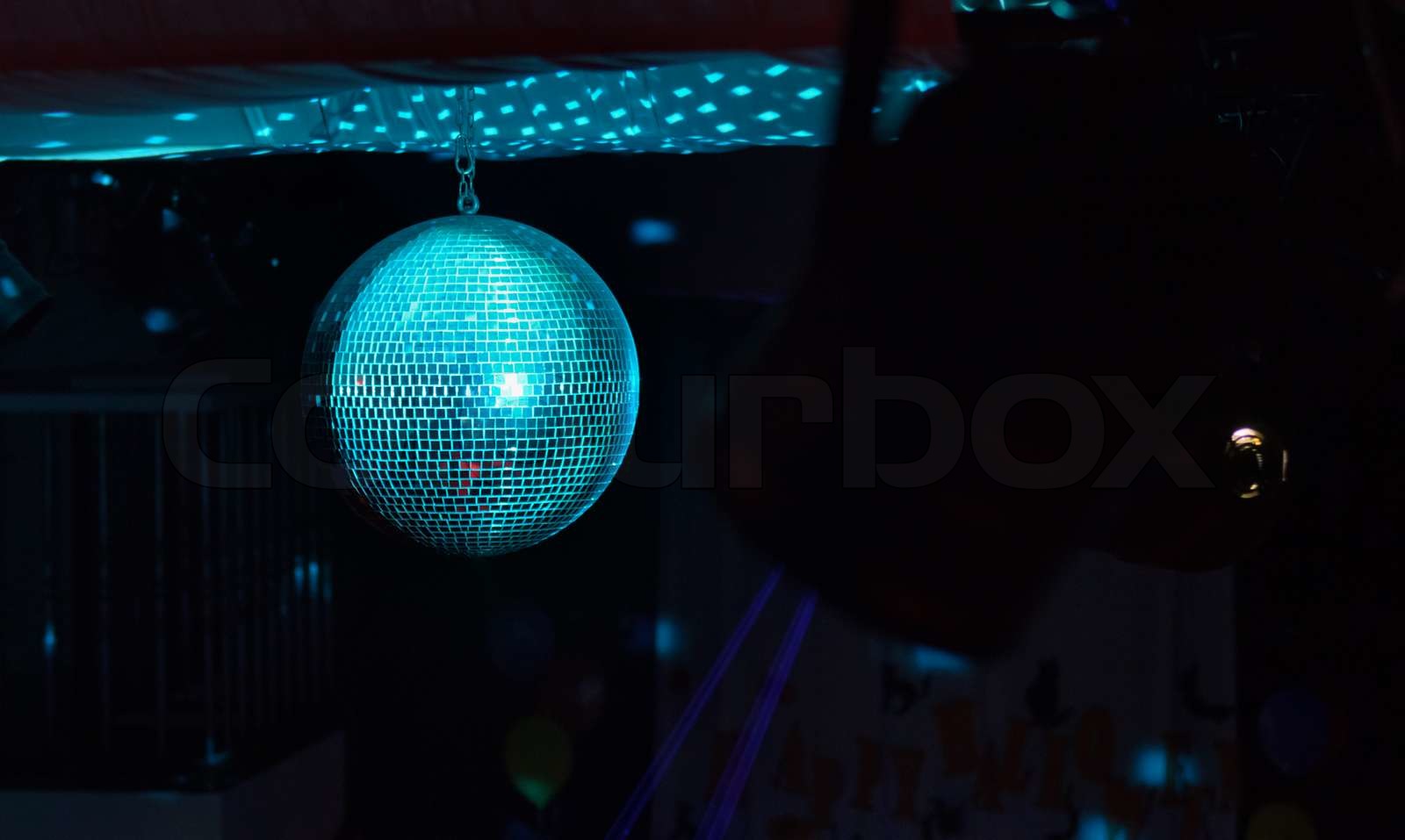 Colorful disco ball in a nightclub | Stock image | Colourbox