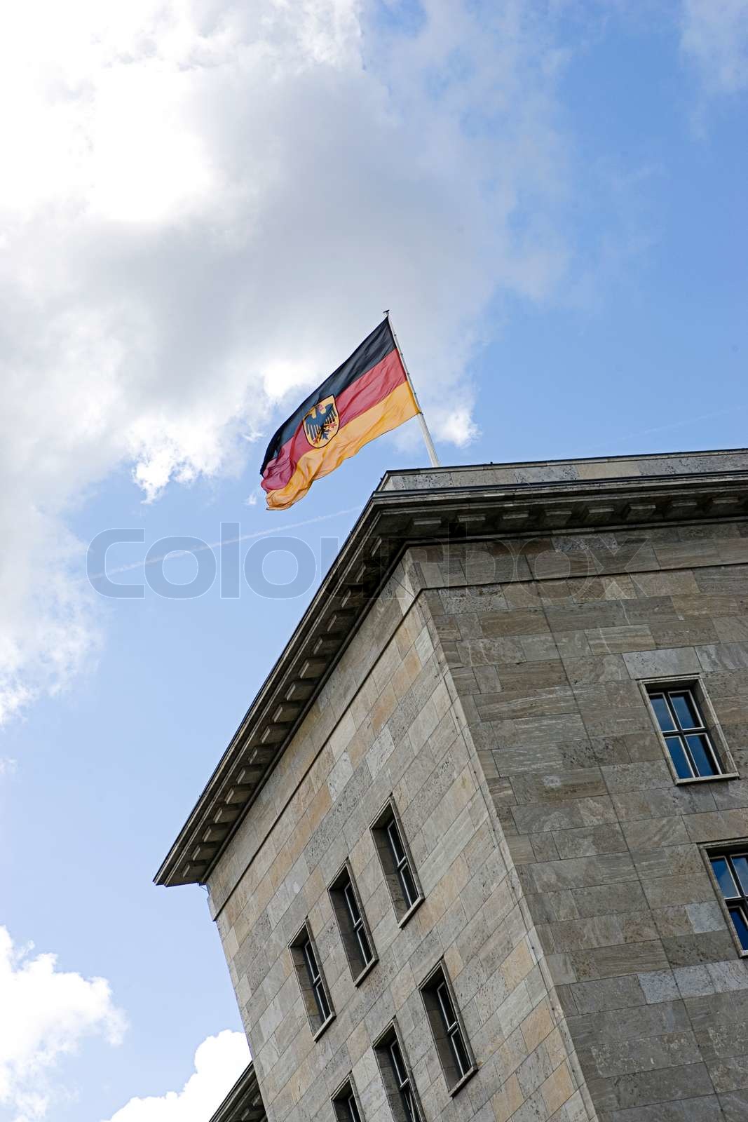 German flag hoisted on top of a building | Stock image | Colourbox