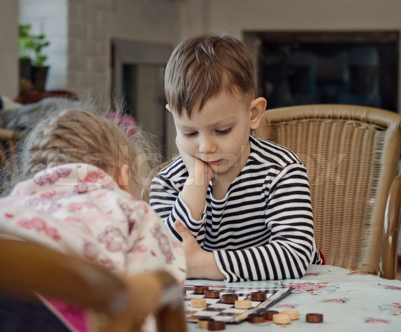 Little boy planning his strategy | Stock image | Colourbox