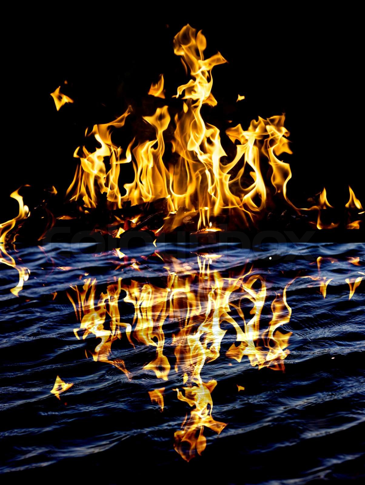 flame fire with reflection in water | Stock image | Colourbox