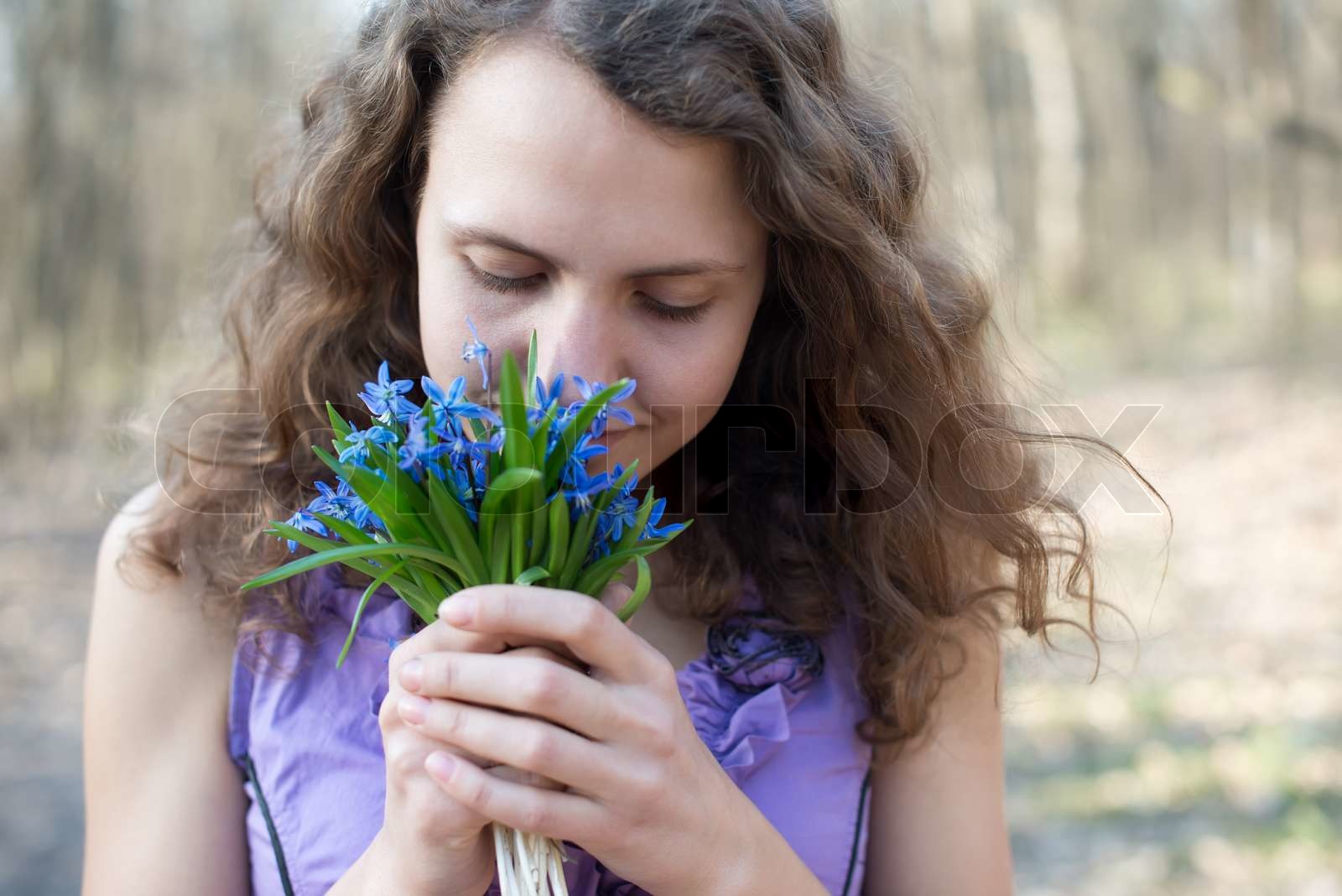 Beautiful teen girl smell | Stock image | Colourbox
