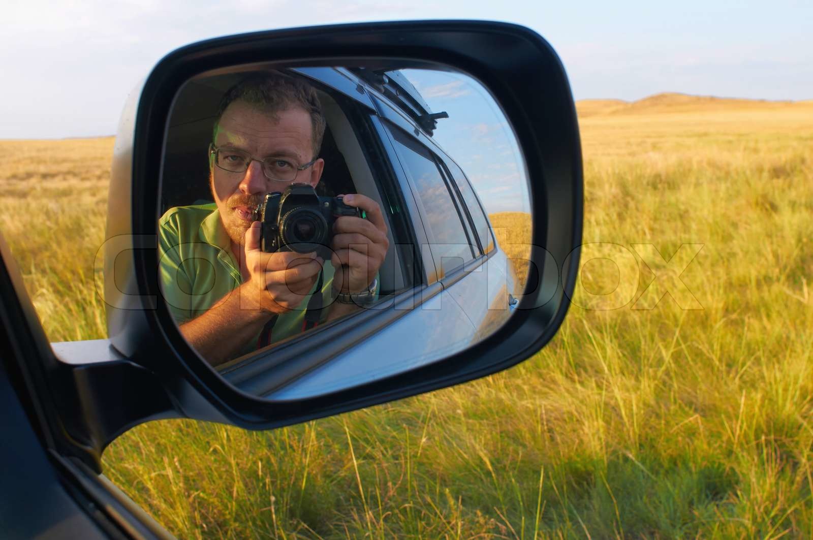Self-portrait in car | Stock image | Colourbox