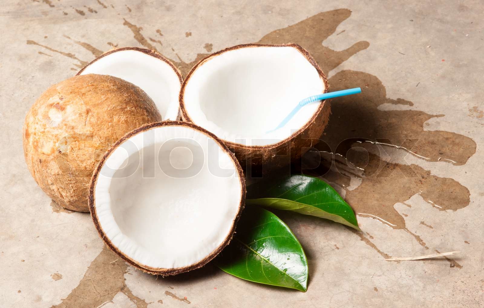 Coconut with straw | Stock image | Colourbox