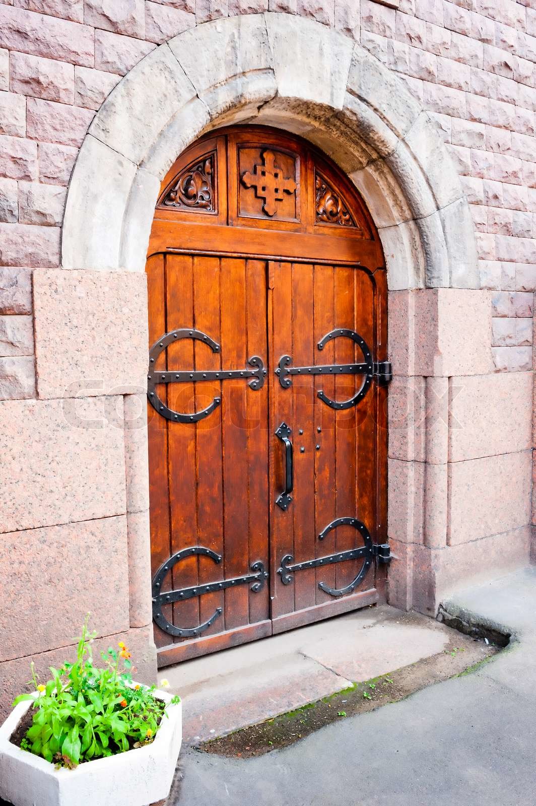 wooden medieval gate in the stone wall of the castle | Stock image ...