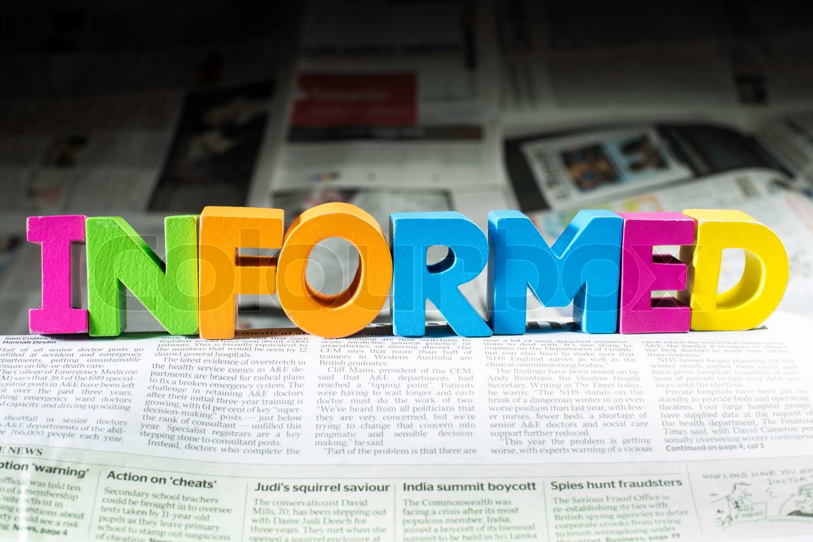 Word informed on newspaper | Stock image | Colourbox