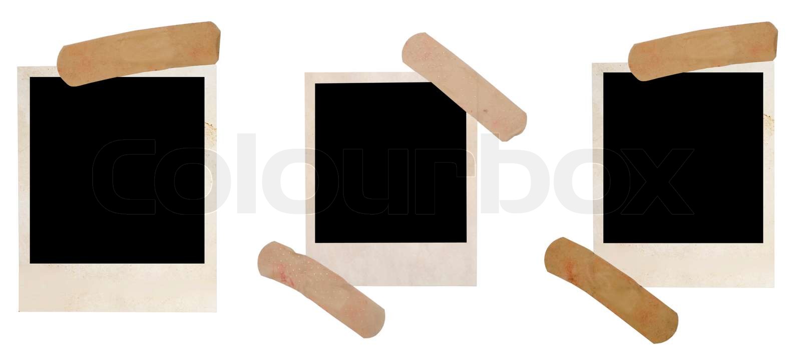 old photo frames with tape | Stock image | Colourbox