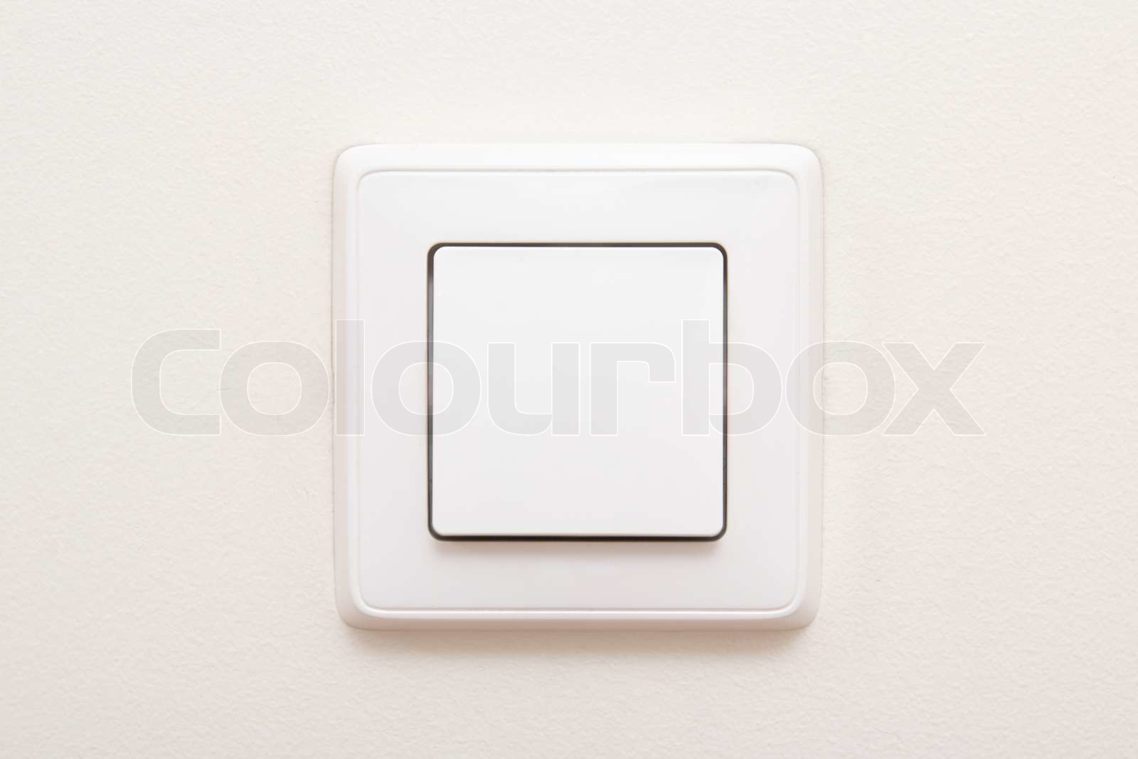 modern light switch on white wall | Stock image | Colourbox