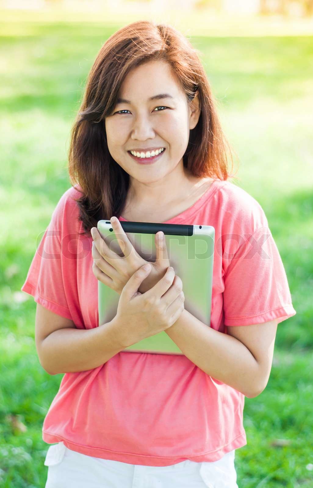 Woman Holding Digital Tablet | Stock image | Colourbox