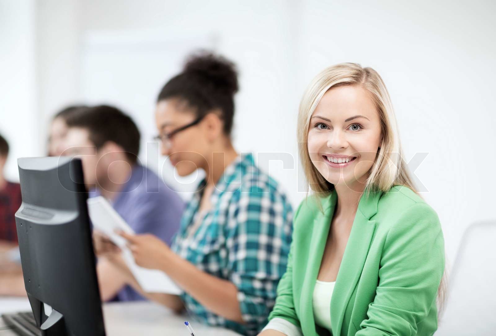student with computer studying at school | Stock image | Colourbox